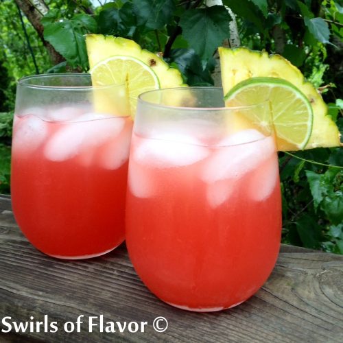 Caribbean Sunset Rum Cocktail - Swirls of Flavor