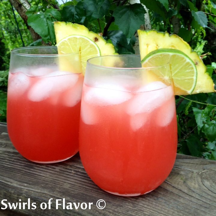 Caribbean Sunset Rum Cocktail - Swirls of Flavor
