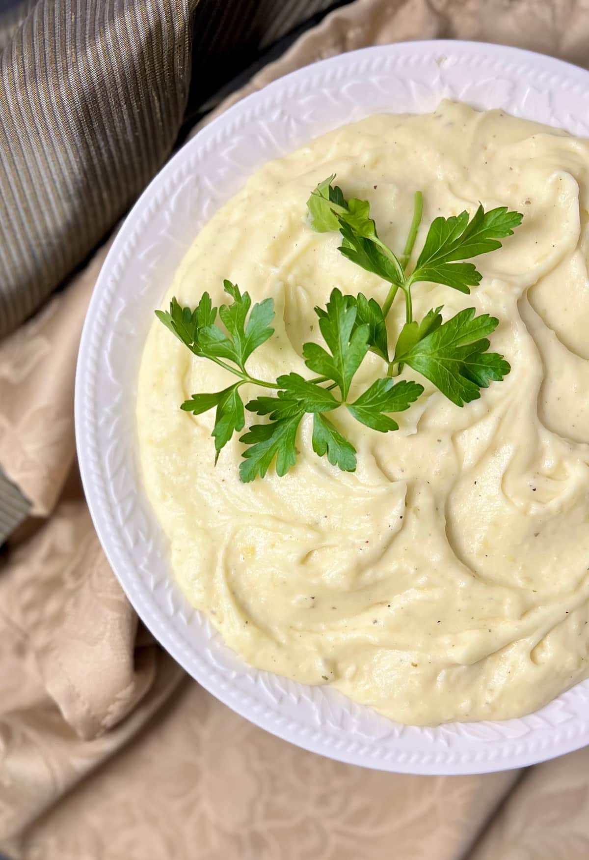 Creamy Boursin Whipped Potatoes - Swirls of Flavor